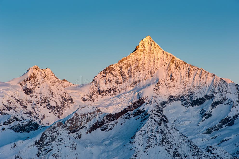 Weisshorn at sunrise stock image. Image of alpine, glacier - 12239387