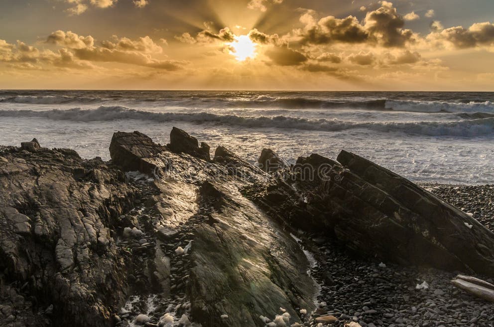 Welcombe Mouth Bay sunset stock image. Image of pebble - 78262059