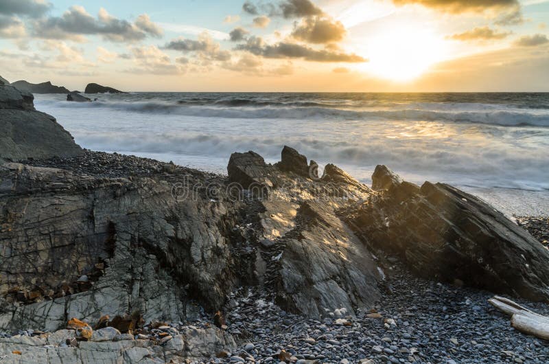 Welcombe Mouth Bay sunset stock image. Image of welcombe - 78262229