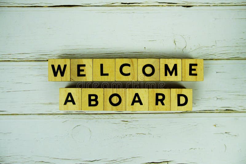 Welcome Aboard with Wooden Blocks Alphabet Letters on Wooden Background ...