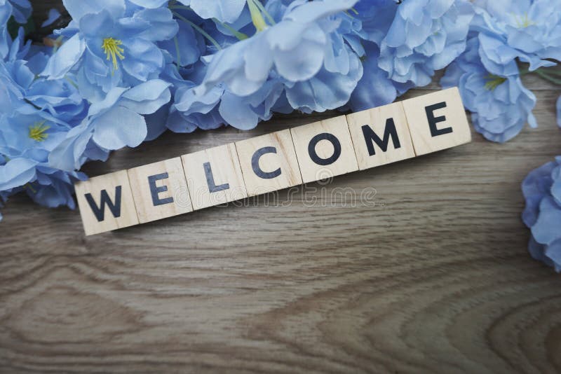 Welcome Alphabet Letter with Space Copy on Wooden Background Stock ...