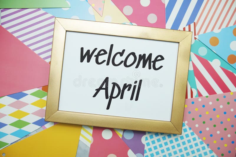 Welcome April Text on Wooden Board with Flowers Frame on Wooden ...