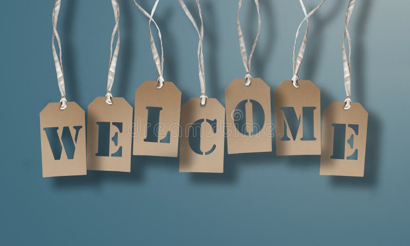 WELCOME on Brown Hang Tags or Cardboard Labels Against Light Blue ...