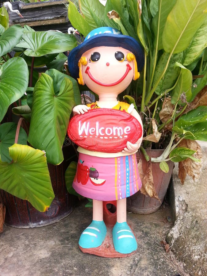 Welcome on clay doll. stock image. Image of welcome, leaf - 42741661