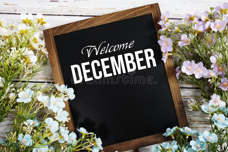 Welcome December Text Message with Flower Decoration on Wooden ...