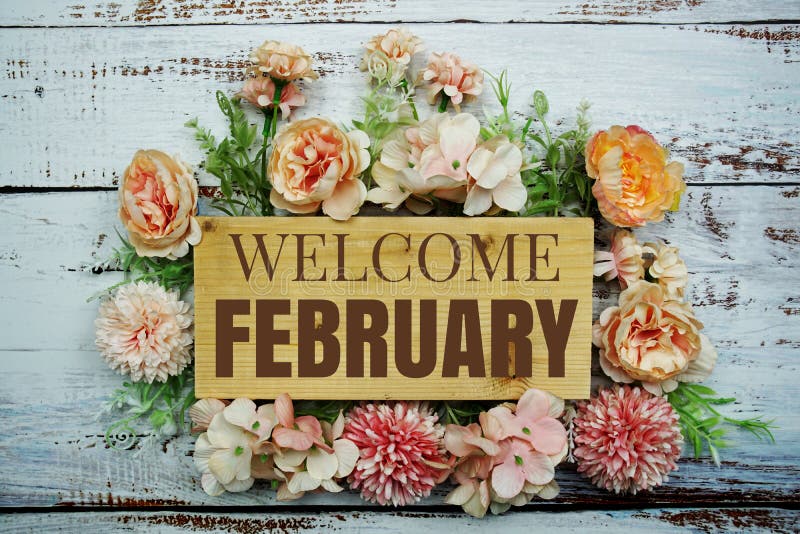 Welcome February Text on Wooden Board with Flowers Frame on Wooden ...