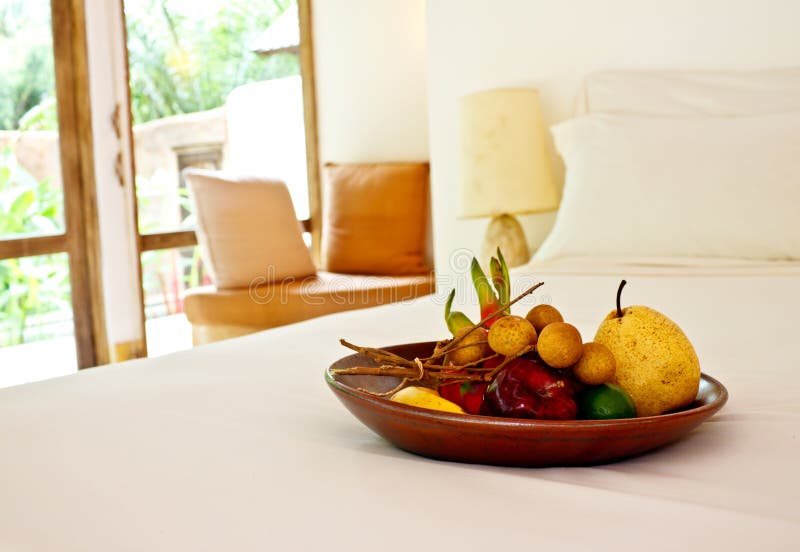 Welcome fruits on the bed stock image. Image of furniture - 26495881
