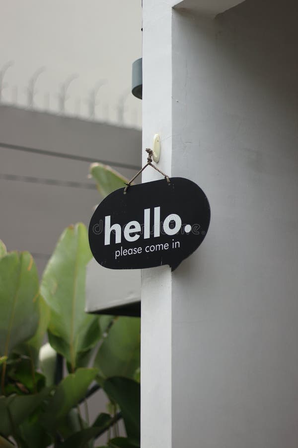 Welcome Greeting at Front Door Stock Photo - Image of front, door: 261668828