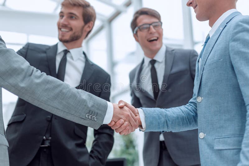 Welcome Handshake of Business People in the Office Stock Image - Image ...