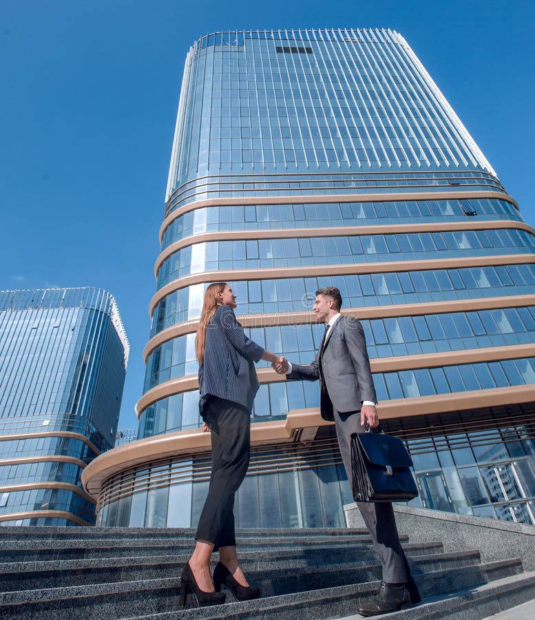 Handshake with building stock photo. Image of people - 122013492