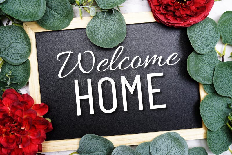 Welcome Home Text on Blackboard and Eucalyptus Leaves Decoration on ...