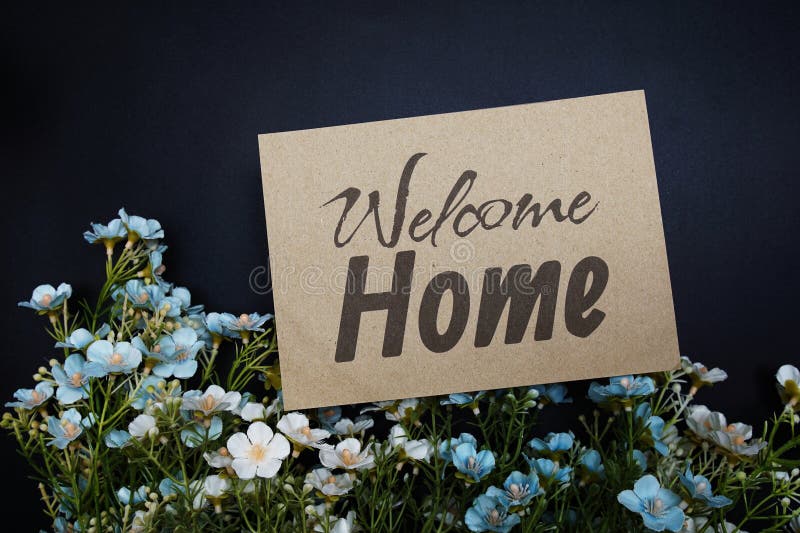 Welcome Home Text Message with Flower Decoration on Black Background ...