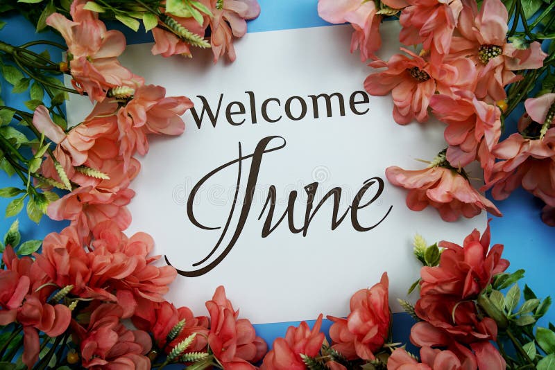 Welcome June Text and Blue Flower Decoration on Wooden Background Stock ...