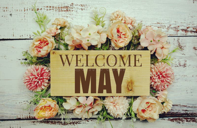 Welcome May Text on Wooden Board with Flowers Frame on Wooden ...