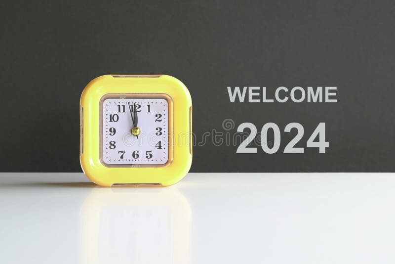 Welcome 2024, Next To a Clock Stock Photo - Image of note, desk: 287322664