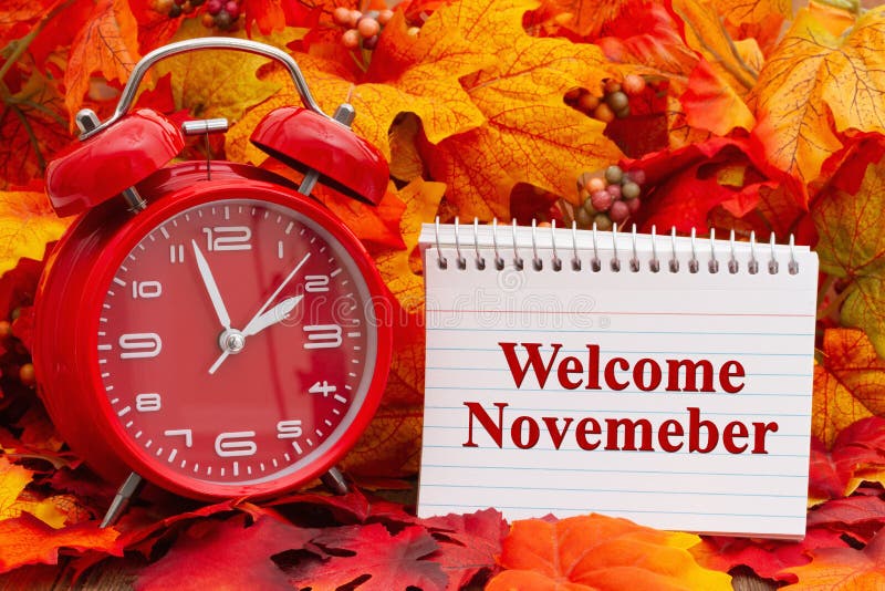 Welcome November Message with an Alarm Clock and Fall Leaves Stock ...