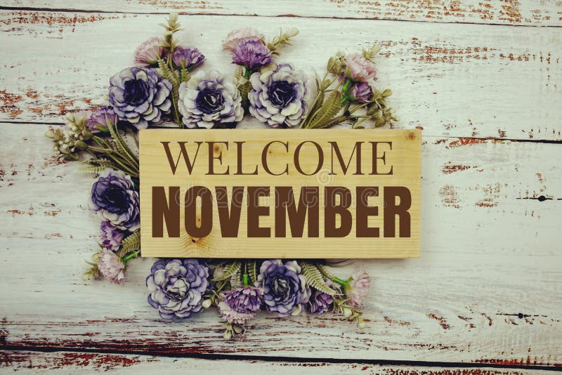 Welcome November Text on Wooden Board with Flowers Frame on Wooden ...
