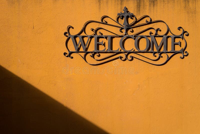 Welcome on Orange Wall with Shade and Shadow Stock Photo - Image of ...
