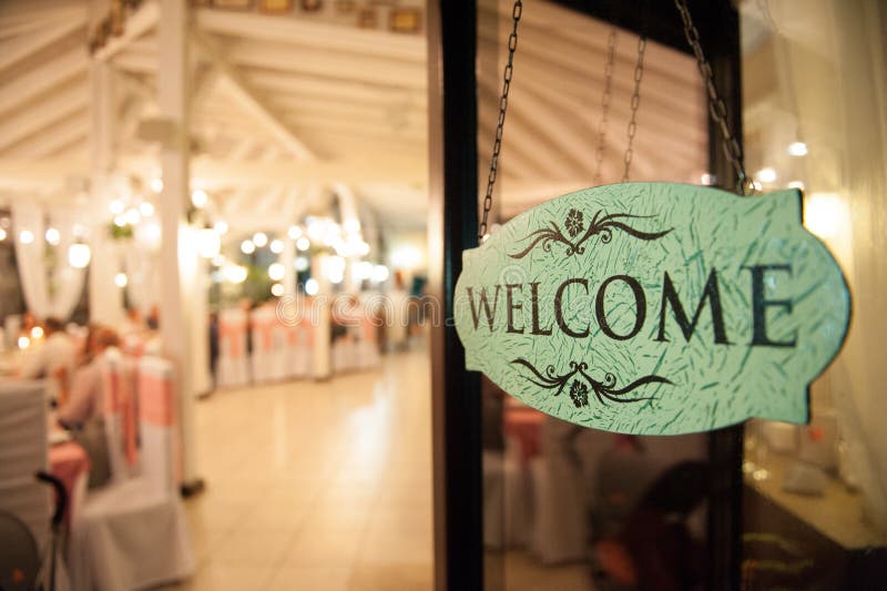Welcome Plate with a Electric Lamps in the Background Stock Image ...