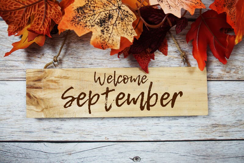 Welcome September Text Message Written on Sign Board Hanging with ...
