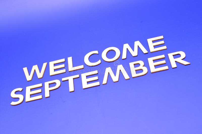 Welcome September Write on Blue Background Stock Photo - Image of ...