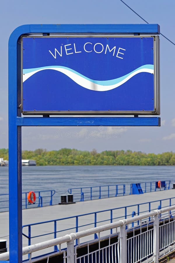 Welcome sign blue stock image. Image of board, fence - 251192461