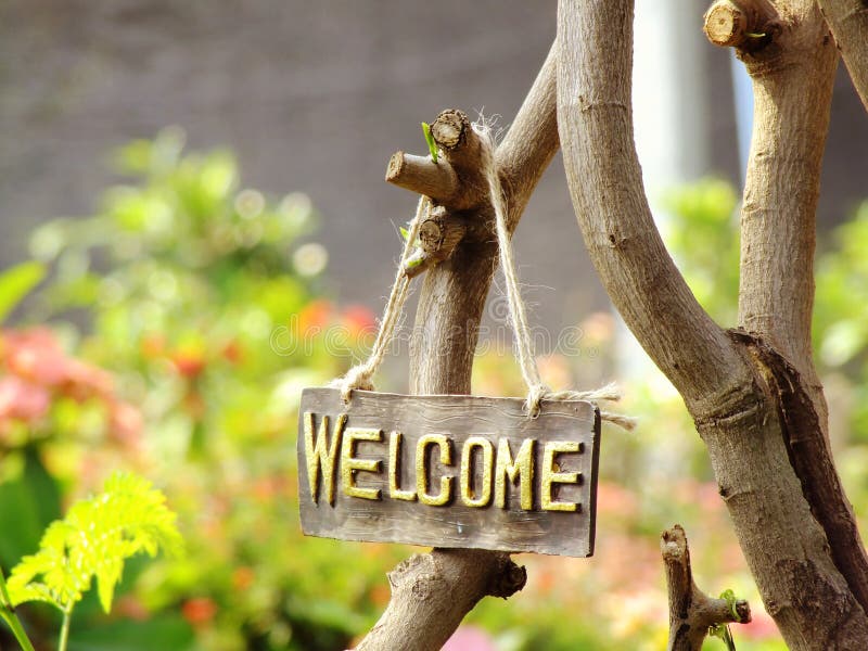 Welcome Sign Hanging In The Garden Stock Image - Image of floral ...