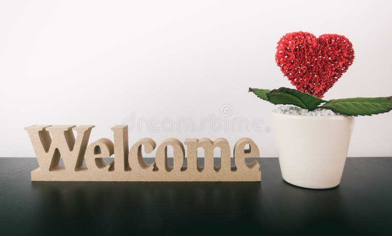 Welcome Sign with Heart Flower Pot Stock Photo - Image of symbol ...