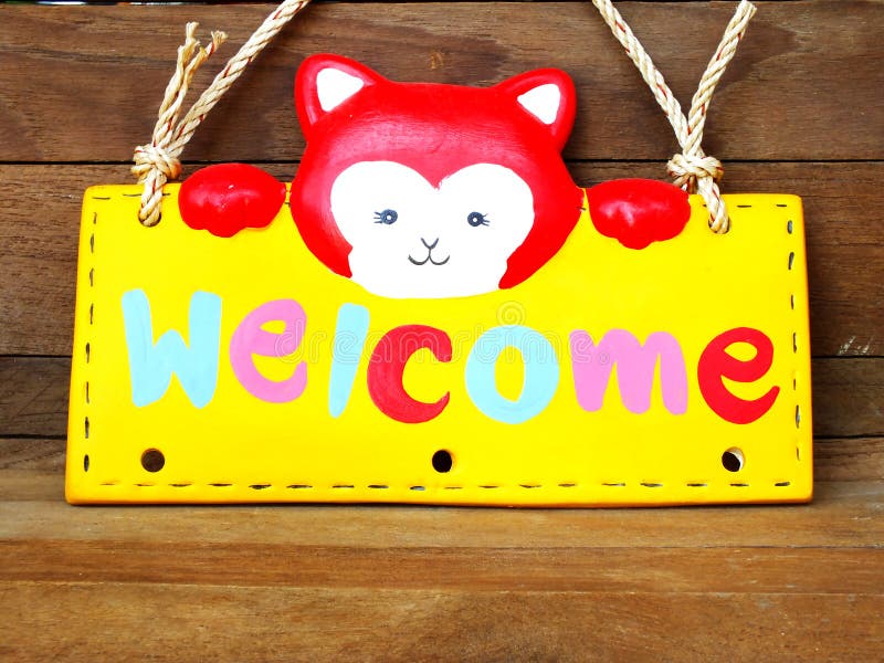 Cute Welcome Sign on the Brick Wall Stock Image - Image of glass, sign ...