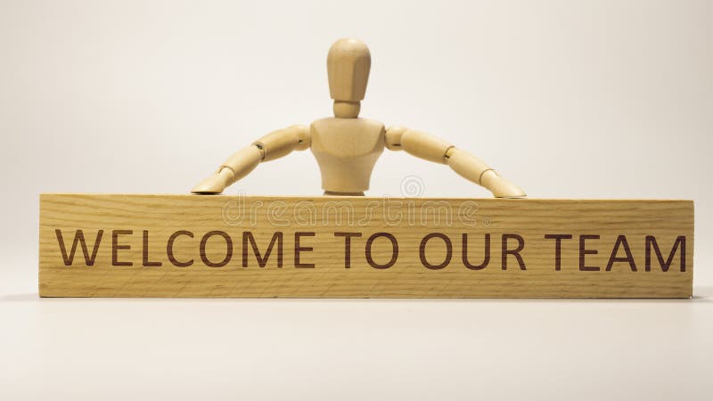 Welcome To Our Team is Written on the Wooden Surface. Wooden Concept ...