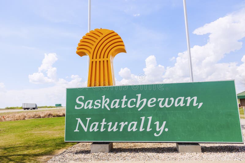 Welcome To Saskatchewan - Sign and Flags Editorial Image - Image of ...