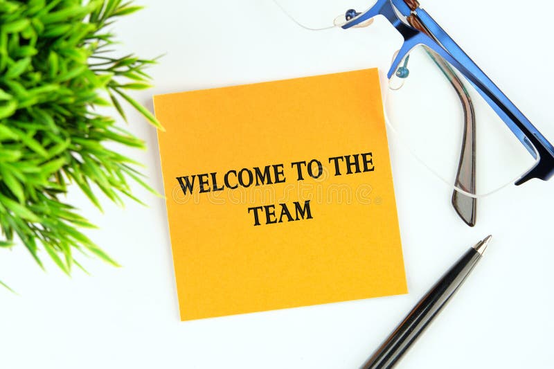 WELCOME TO the TEAM Text Written on an Orange Sticker on a White ...