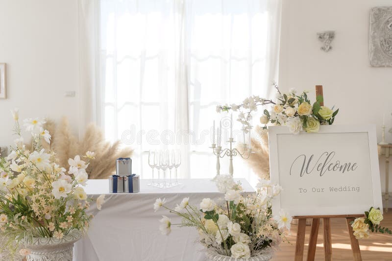 Welcome To Wedding Sign and Reception Table Decorated with Flowers ...