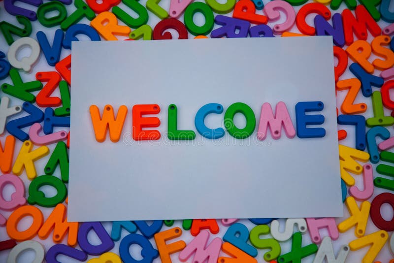 Welcome Written with Alphabet Blocks on a Paper Stock Photo - Image of ...