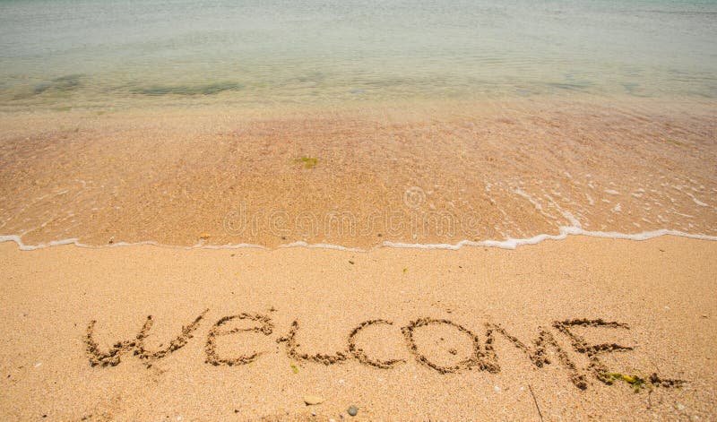 Welcome Written in a Sandy Beach Stock Photo - Image of relax, hope ...