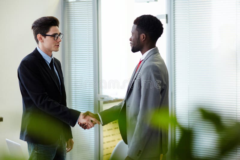 Welcoming business partner stock image. Image of negotiation - 99620197