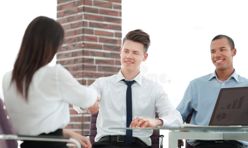 Welcoming Handshake of a Manager and the Customer in the Office. Stock ...