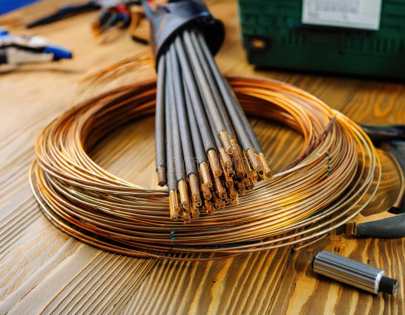 Weld Wire Bundled on Wooden Workbench with Tools in a Construction ...