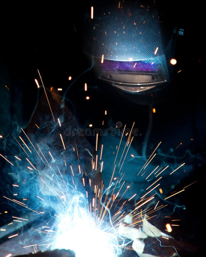 Welder in Action with Bright Sparks. Stock Image - Image of iron, fire ...