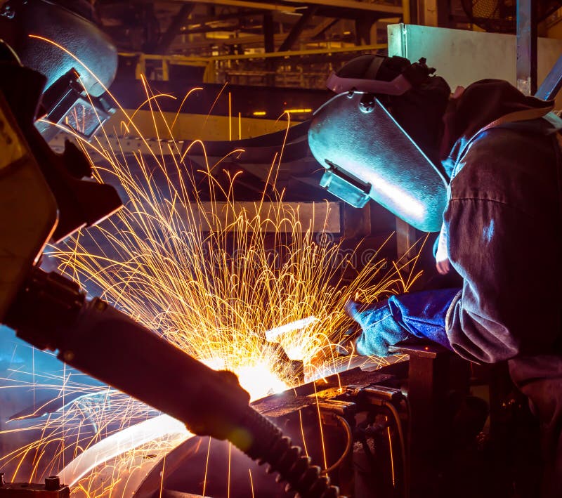Welder and bright sparks. stock image. Image of construction - 68742963