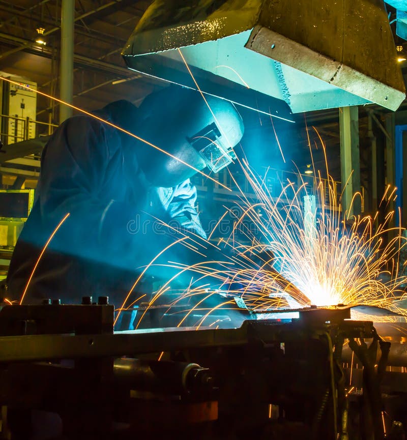 Welder and bright sparks. stock image. Image of construction - 68742963