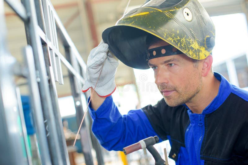 Welder Checking Angle of Welded Materials Stock Image - Image of ...