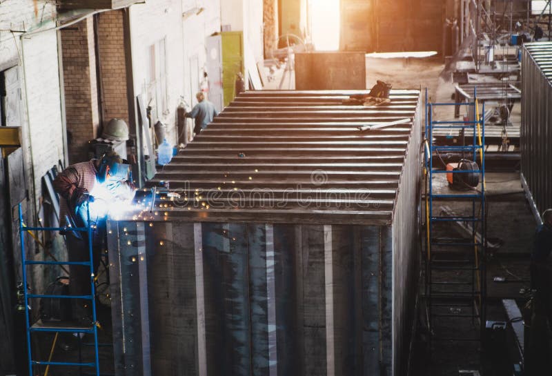Welder Collects a Large Metal Container Stock Image - Image of industry ...