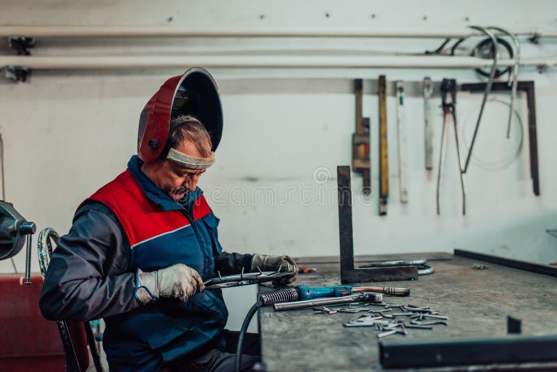 Welder Erecting Technical Steel. Industrial Steel Welder in Factory ...