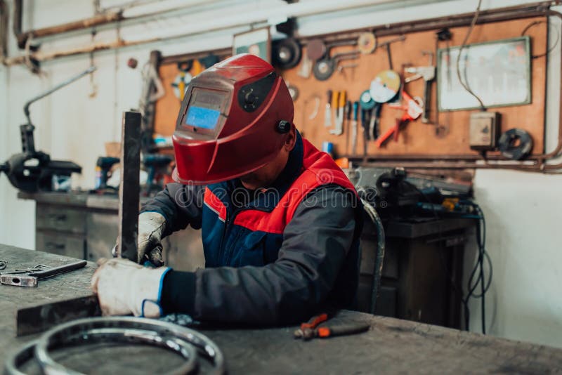 Welder Erecting Technical Steel. Industrial Steel Welder in Factory ...