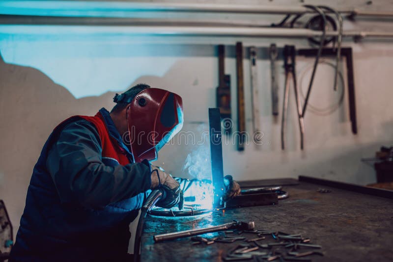 Welder Erecting Technical Steel. Industrial Steel Welder in Factory ...