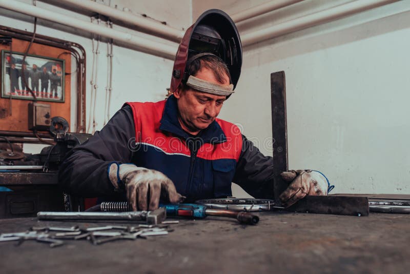 Welder Erecting Technical Steel. Industrial Steel Welder in Factory ...