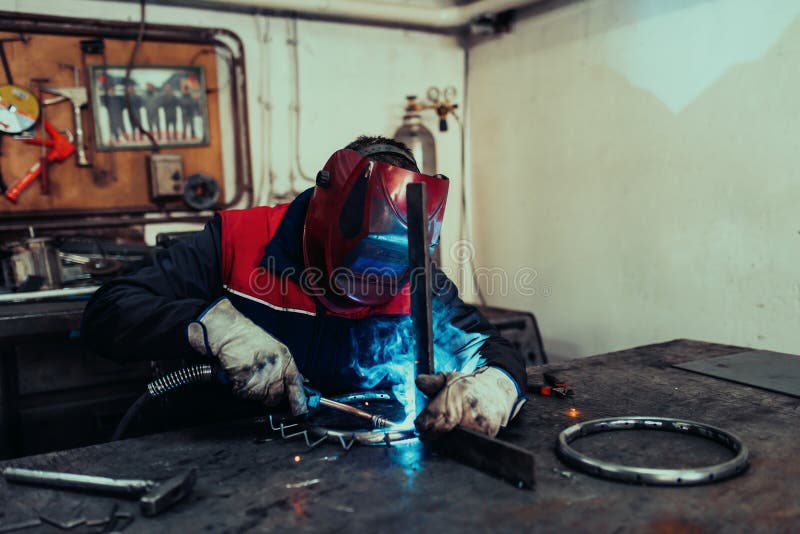 Welder Erecting Technical Steel. Industrial Steel Welder in Factory ...