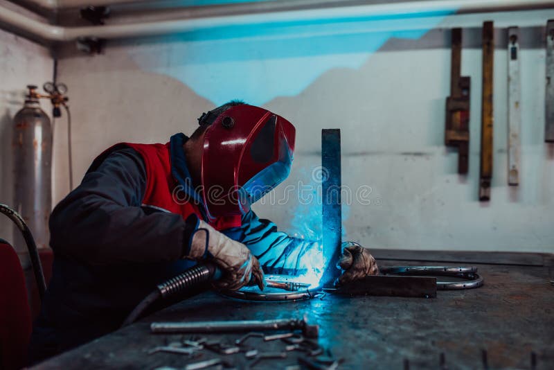 Welder Erecting Technical Steel. Industrial Steel Welder in Factory ...