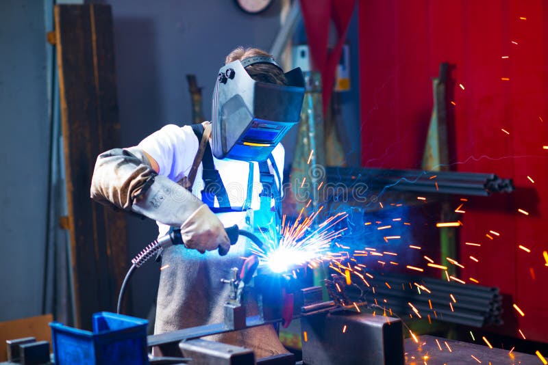 Welder in factory stock image. Image of engineer, handcrafter - 87289447